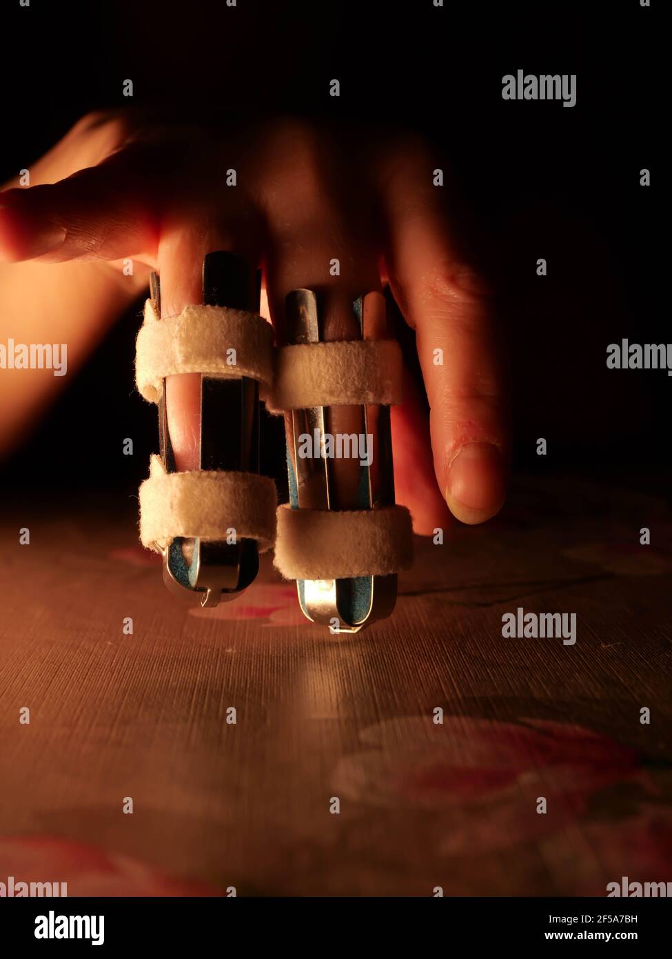 Grey plastic two-sided Finger Splint with two convenient hook-and-loop ...