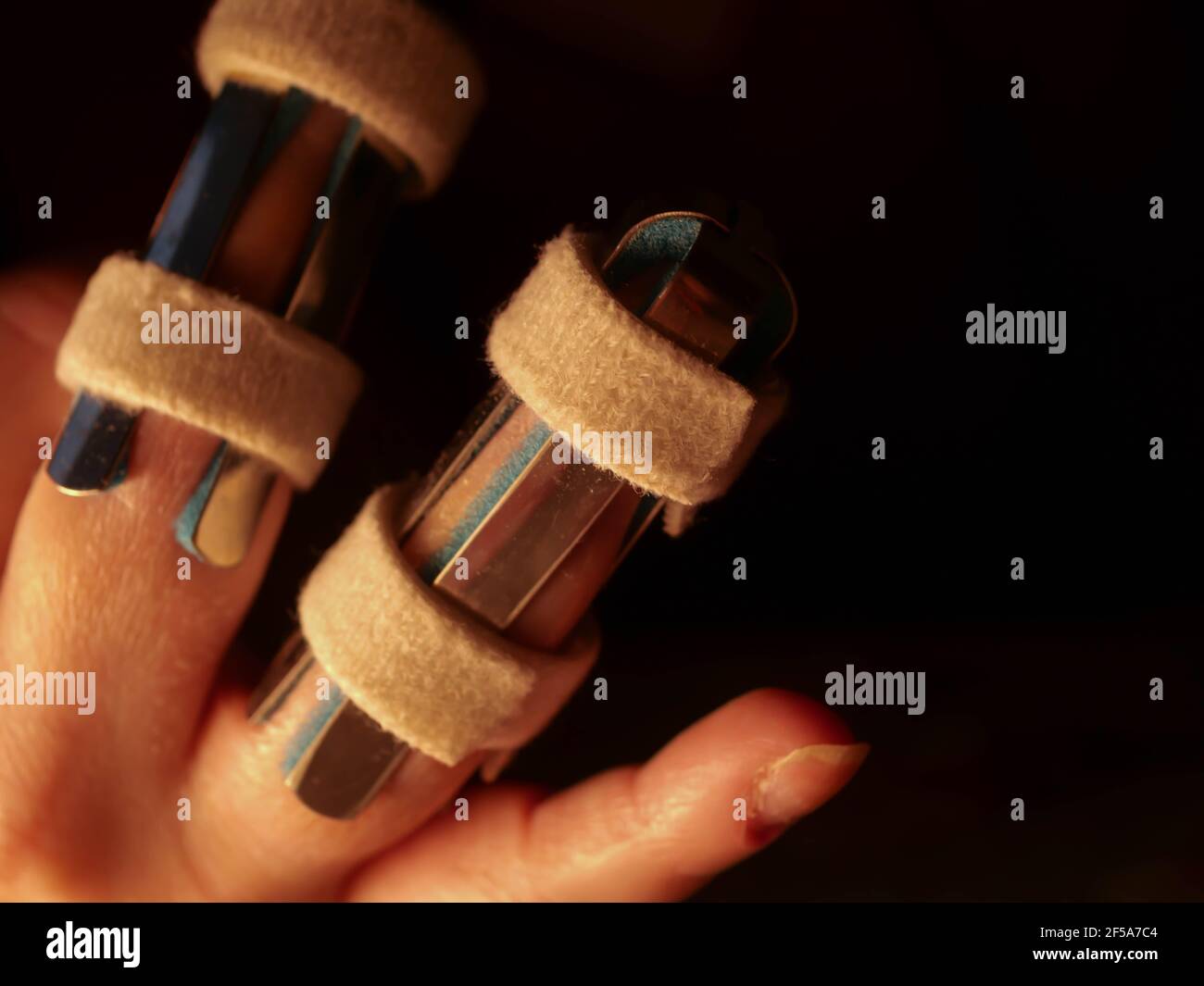 Grey plastic two-sided Finger Splint with two convenient hook-and-loop ...