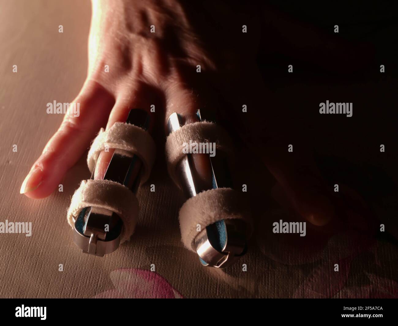 Grey plastic two-sided Finger Splint with two convenient hook-and-loop ...