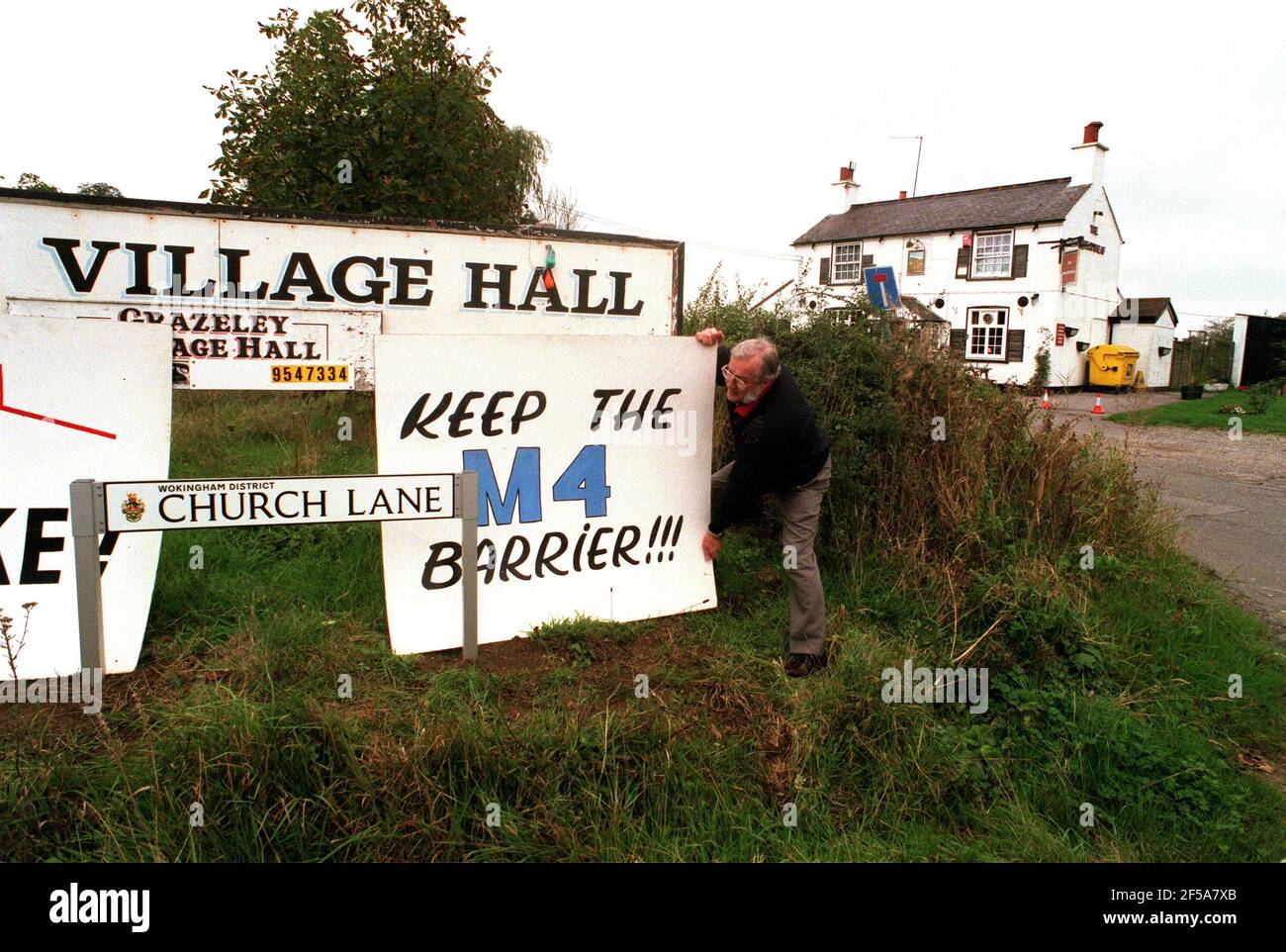 Grazeley Villagers putting up Anti Housing signs 1998as a symbol of ...