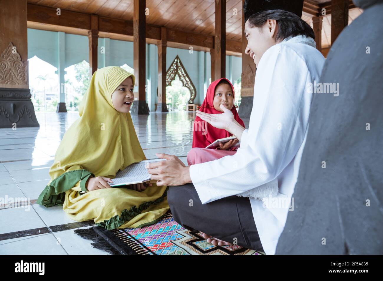 Read quran studying hi-res stock photography and images - Alamy