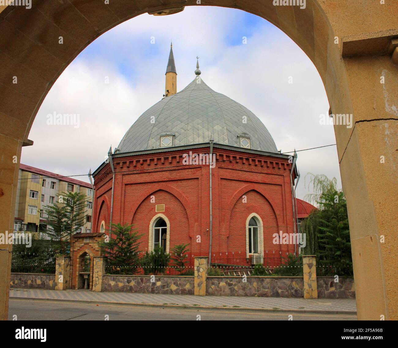 A beautiful red brick mosque. Cuba city. Azerbaijan Stock Photo - Alamy