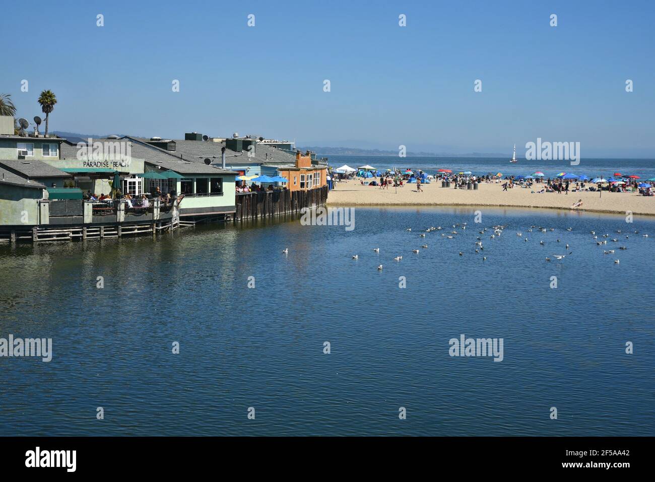 Landscape with scenic lagoon view of local shops and bars at Capitola ...