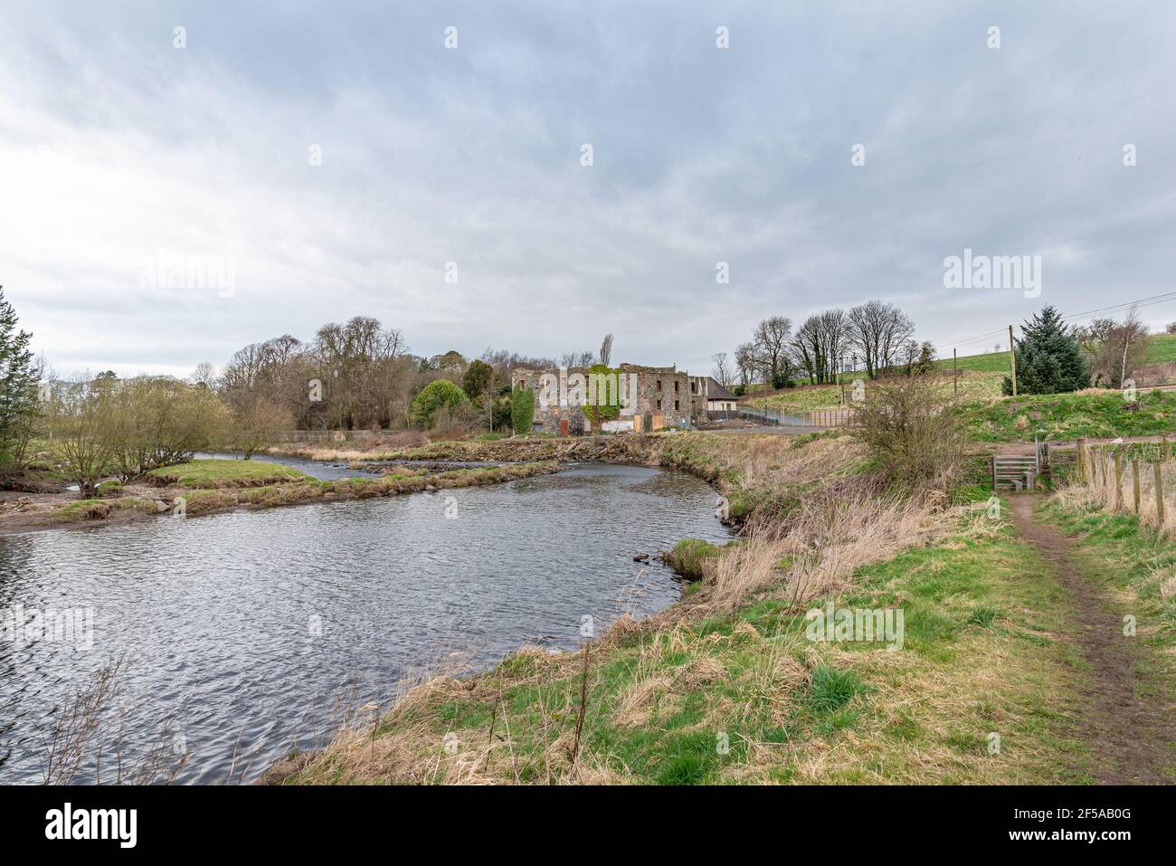 Gatehead, Scotland, UK - March 23, 2021: The ancient Laigh Milton Mill ...