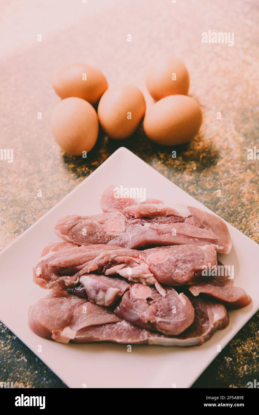 Raw meat and eggs for cooking Stock Photo - Alamy