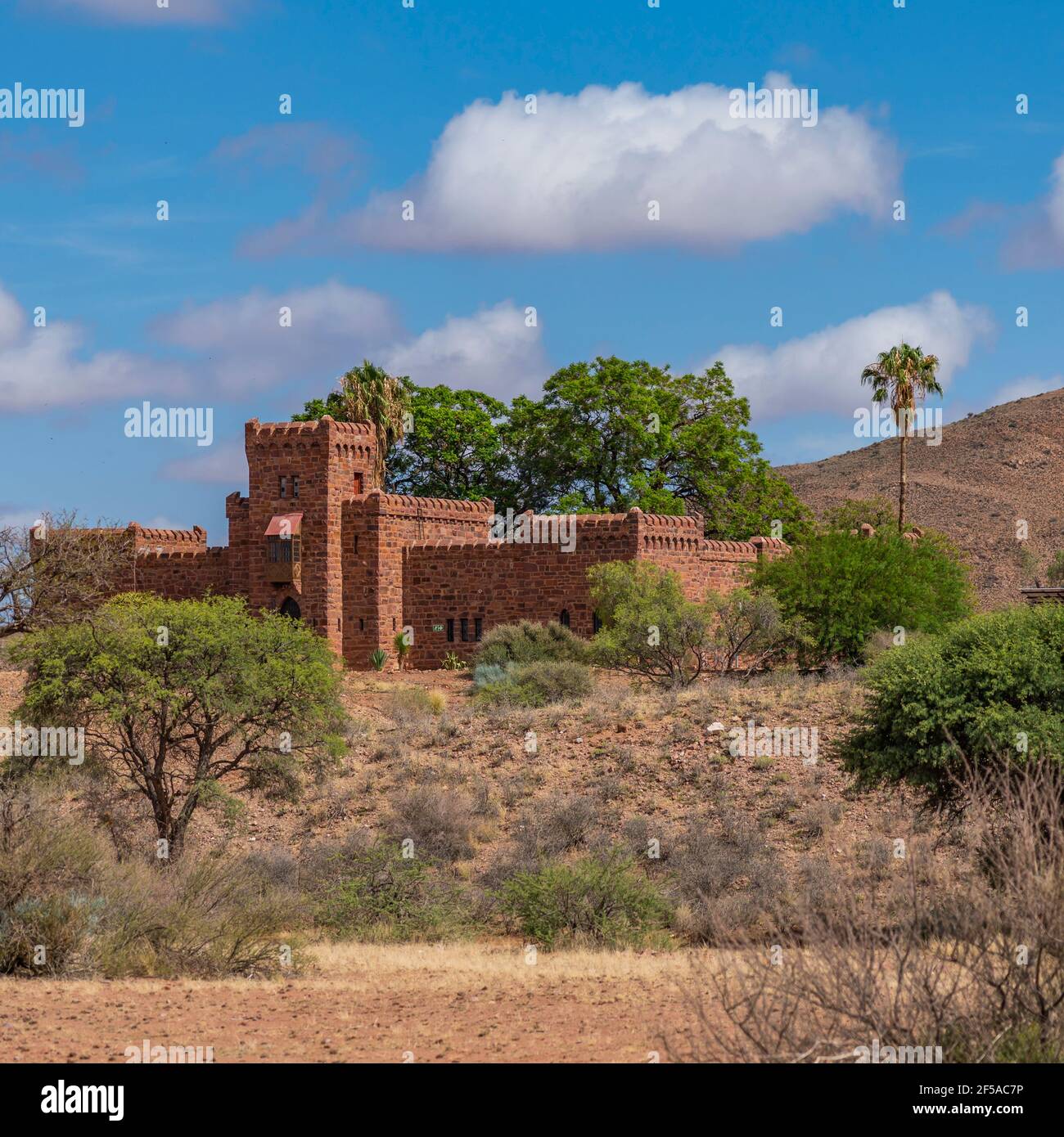 Duwisib Castle in Namib Naukluft national park with blue sky and clouds ...