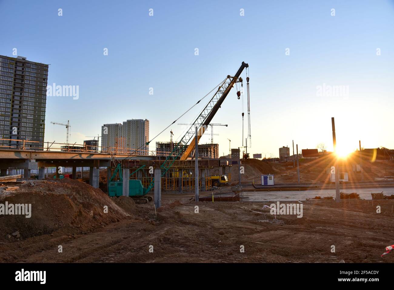 Mobile telescopic boom crane on bridge construction. Truck Crane work ...