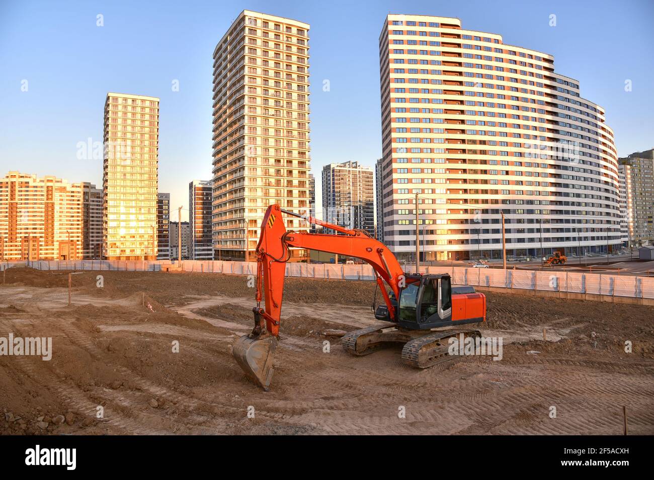 Digging the pit foundation a hole with excavator. Earthwork in ...