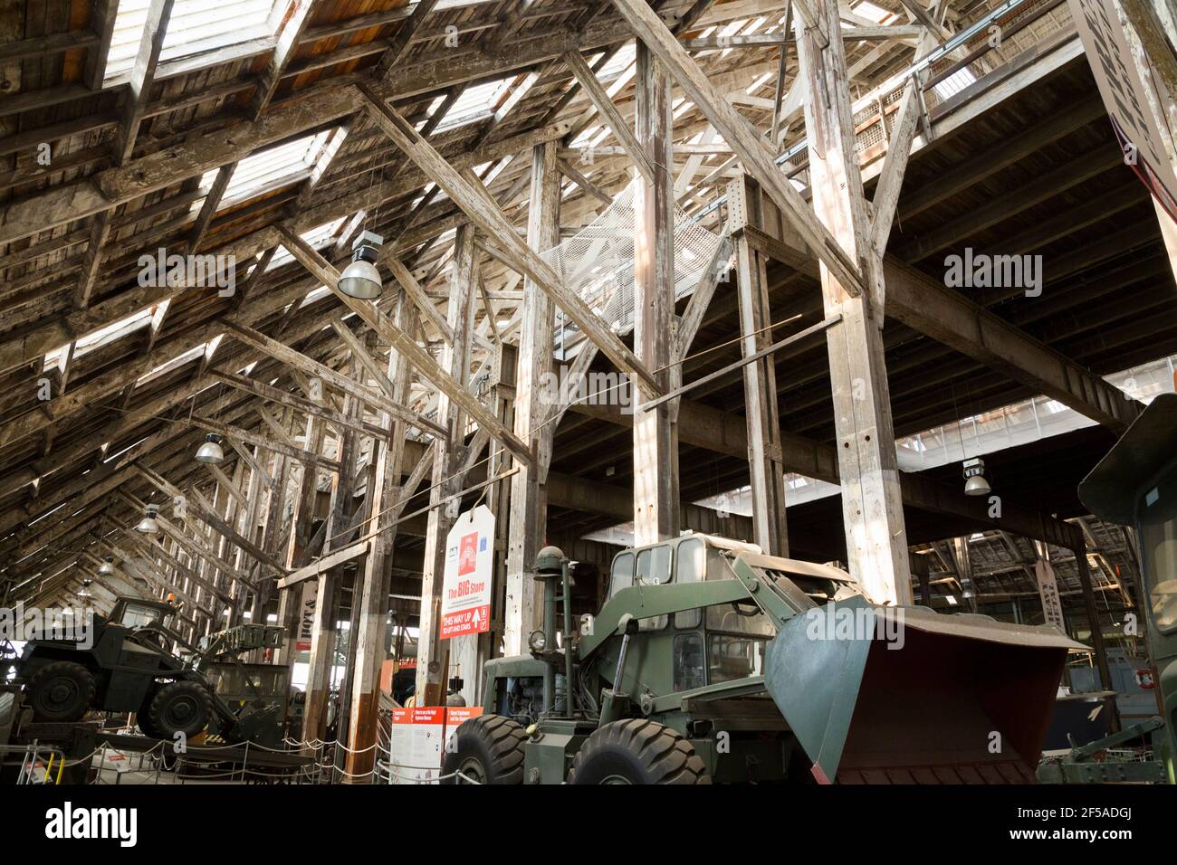 Looking up into the interior / inside the huge and vast timber roof of ...