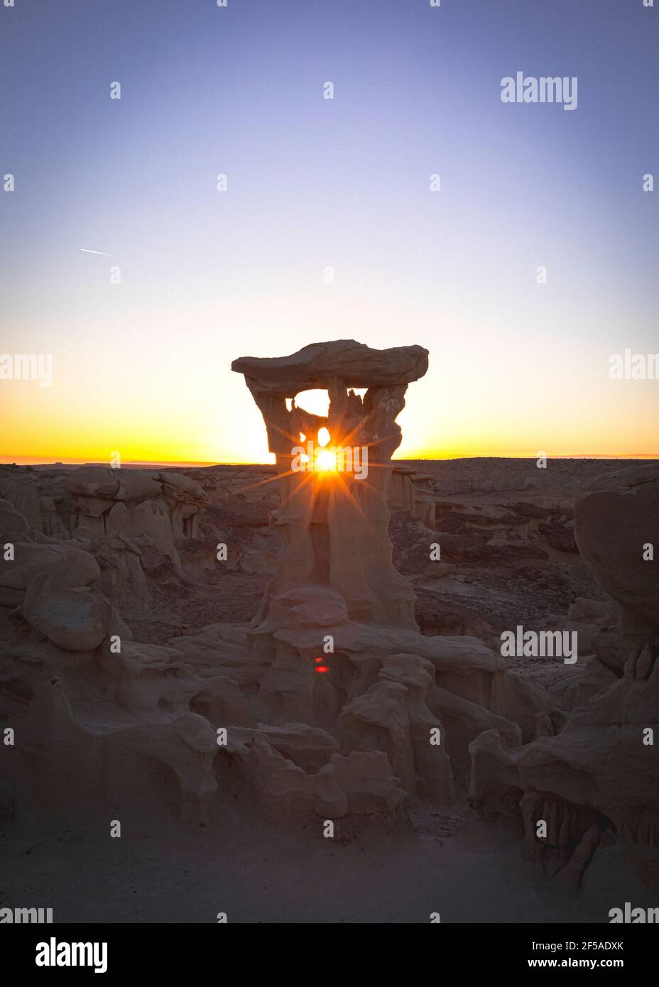 The sun and the Alien throne rock formation, Bad Lands, New Mexico ...