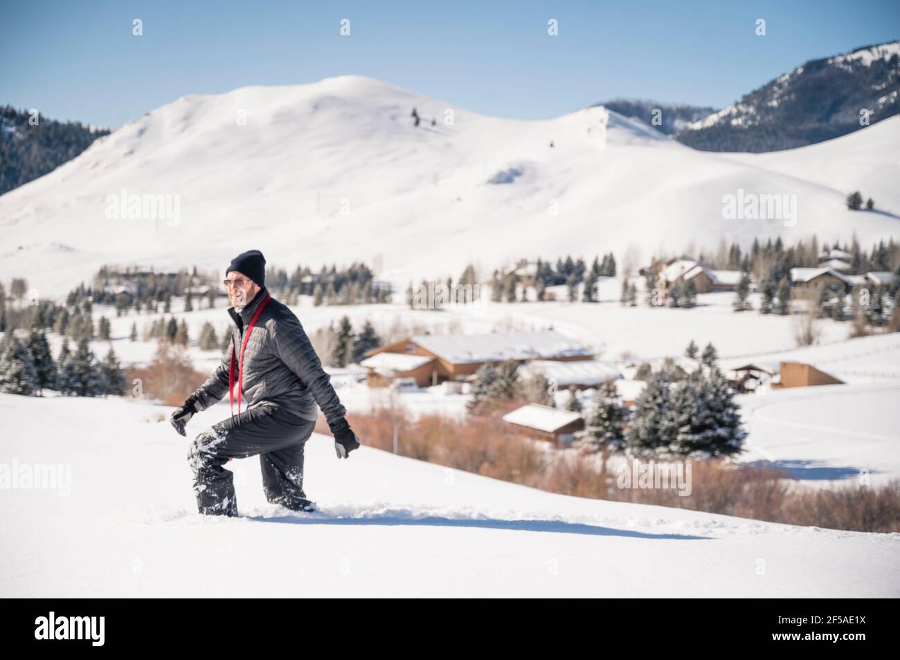 Sunny day at the snowy mountains hi-res stock photography and images ...