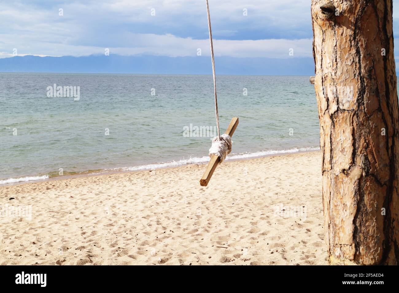 Homemade bungee swing made of rope and stick on the background o Stock ...