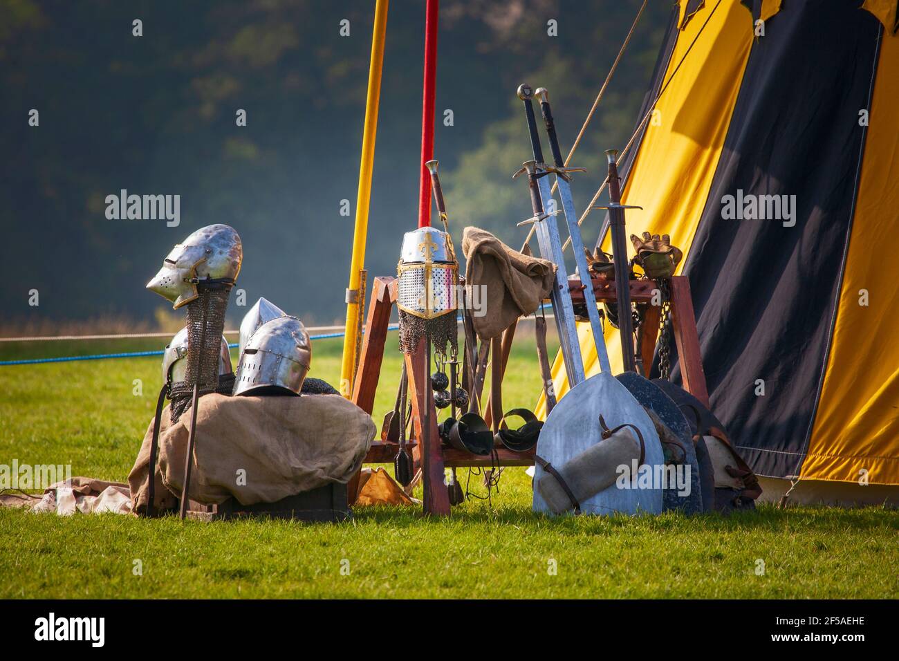Medieval jousting armour, swords and shields at a tournament in England ...