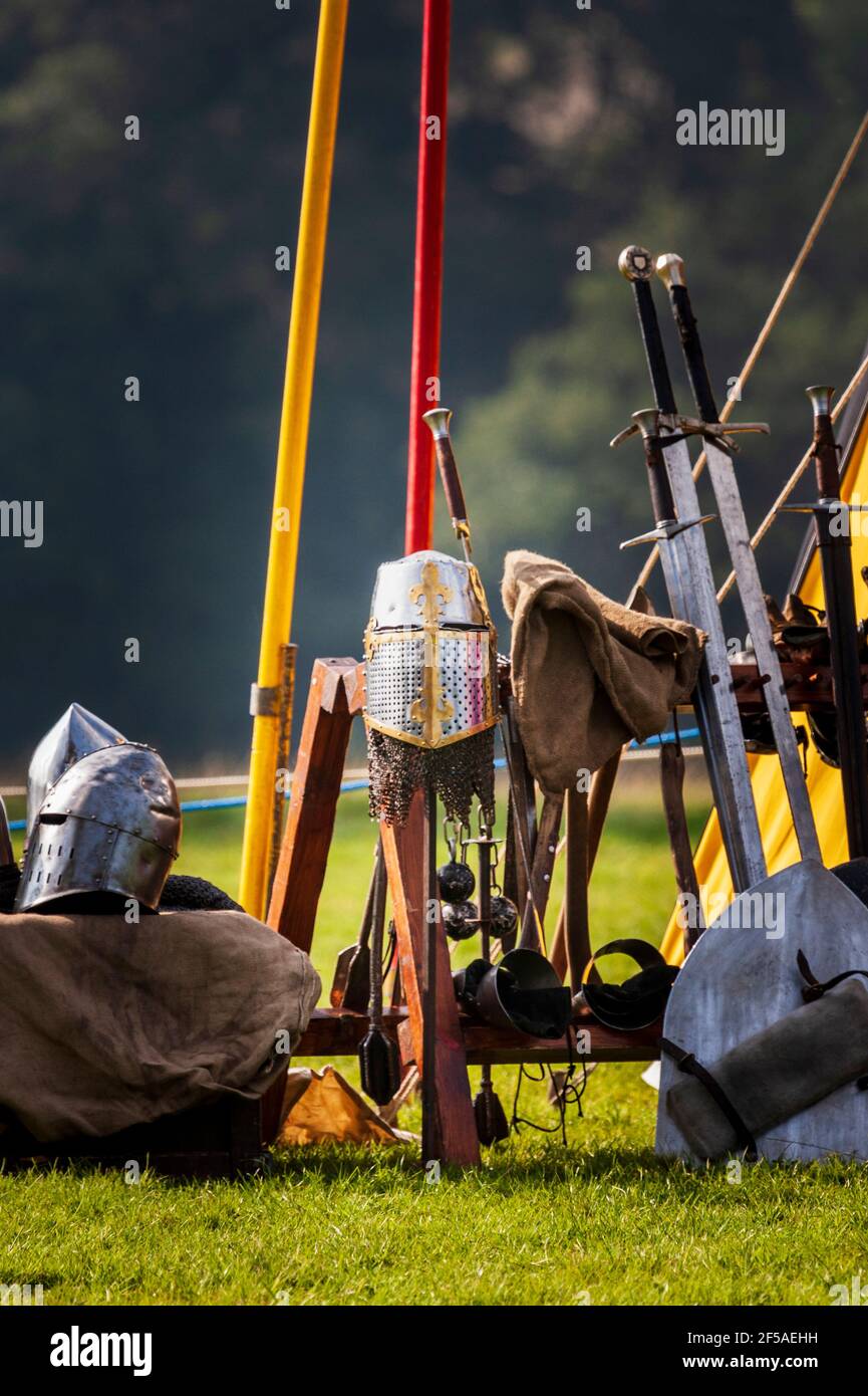 Medieval jousting armour, swords and shields at a tournament in England ...