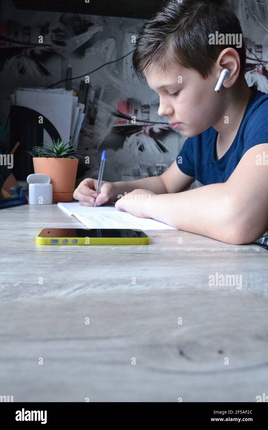 Teen boy writing pen hi-res stock photography and images - Alamy