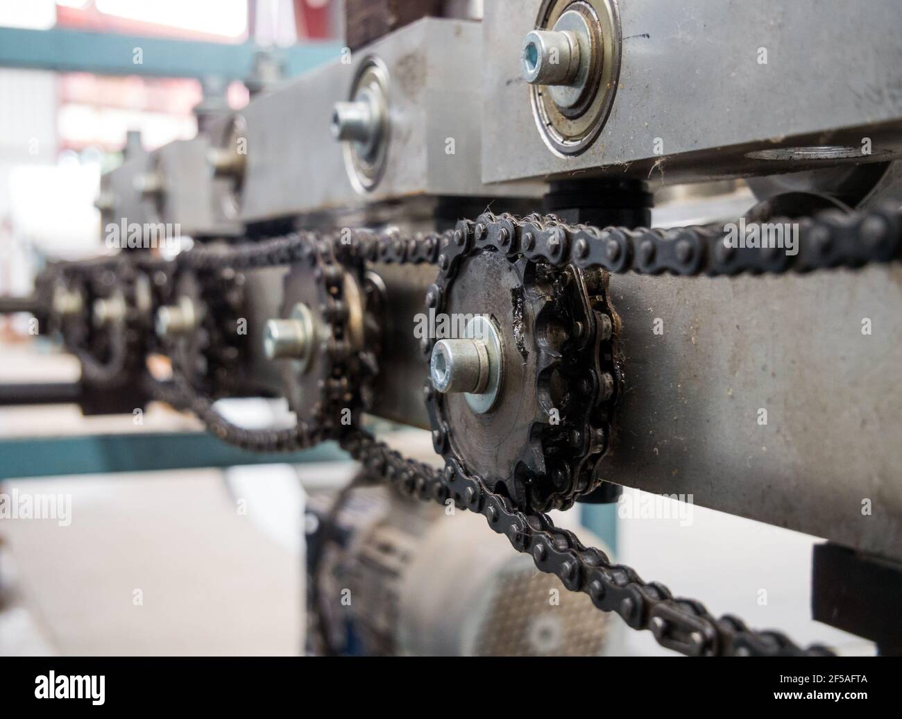 Chain drive in the drive of the rolling machine Stock Photo - Alamy