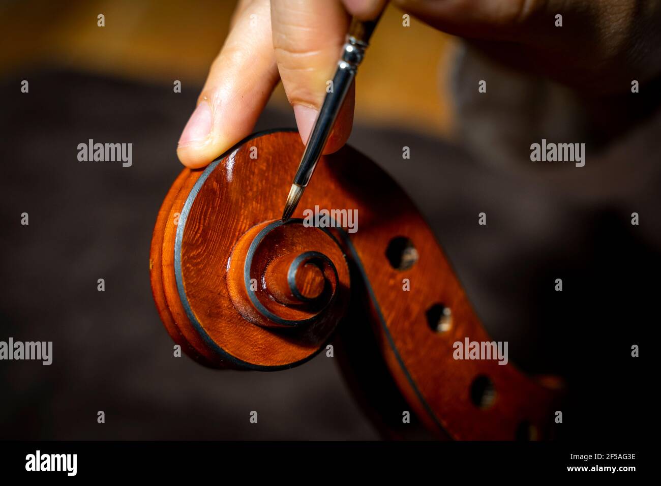 Female violin maker work hi-res stock photography and images - Alamy