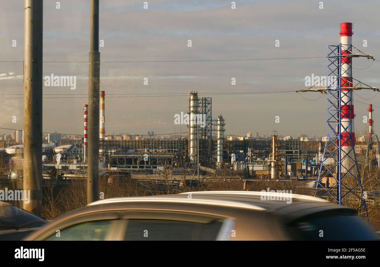 Corps of Moscow refinery in spring in clear weather 2021 Stock Photo ...