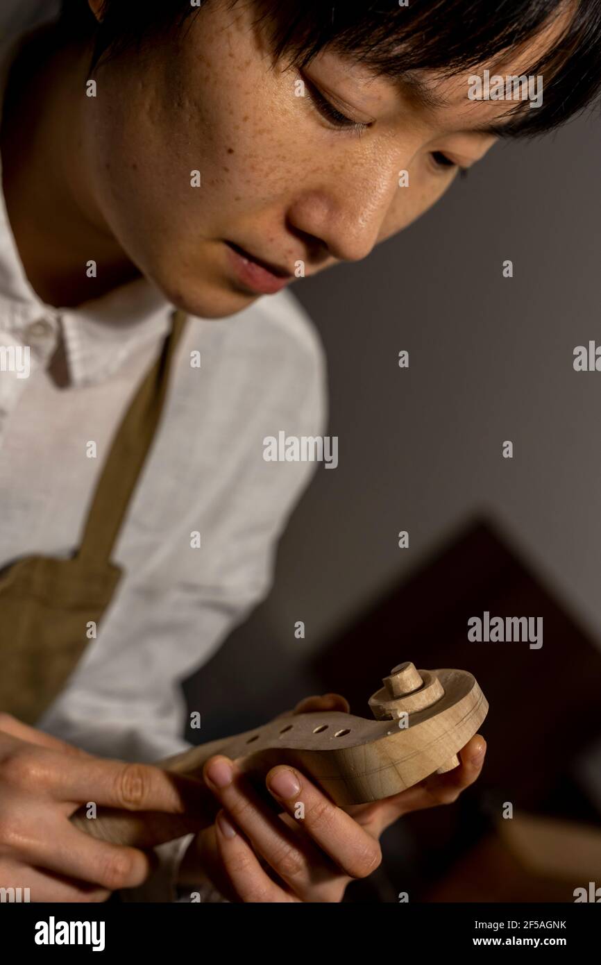Female violin maker work hi-res stock photography and images - Alamy