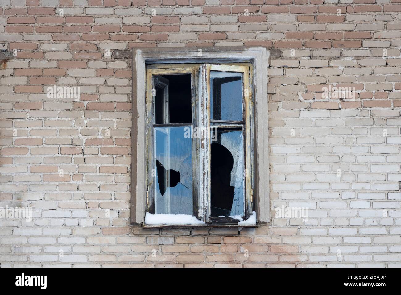 abandoned house. broken glass in the windows. emergency housing. High ...