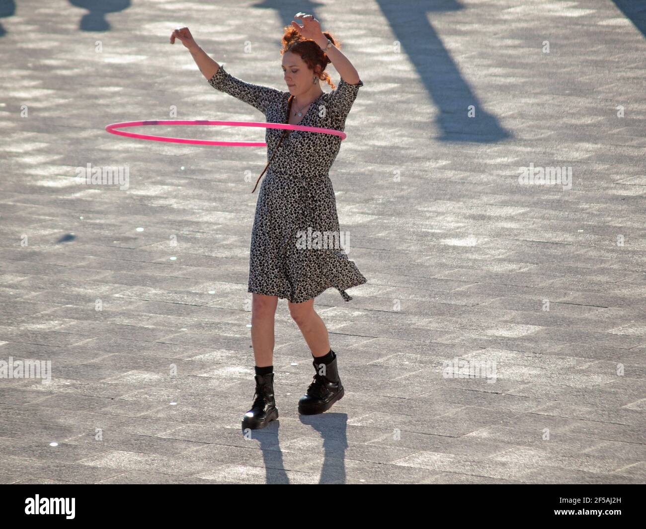 Woman hula hooping hi-res stock photography and images - Alamy