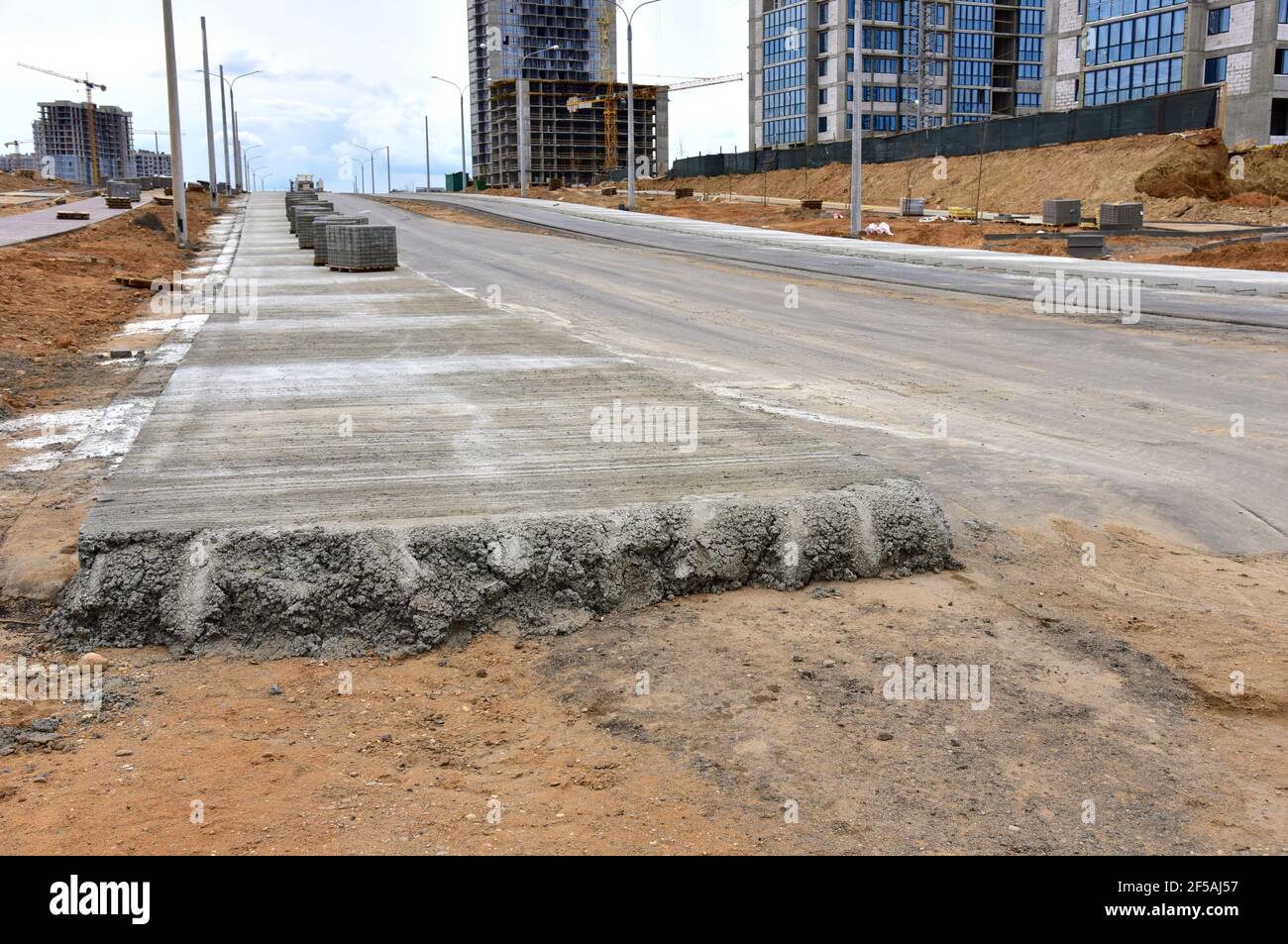 Road works activity at construction site. Construction and development ...