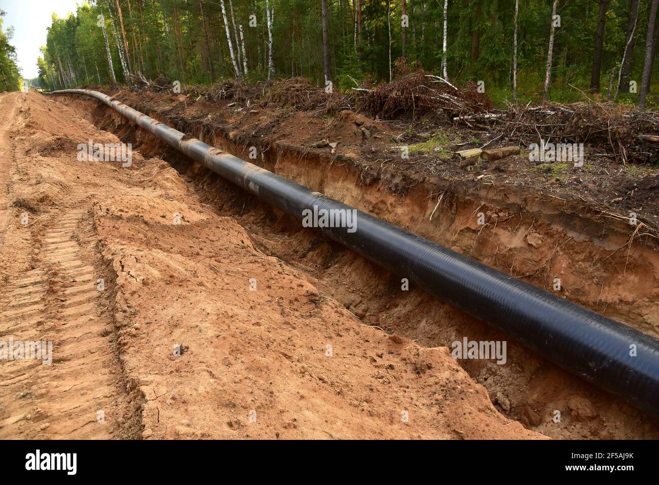 Trench in ground for laying pipeline of natural gas. Building of ...