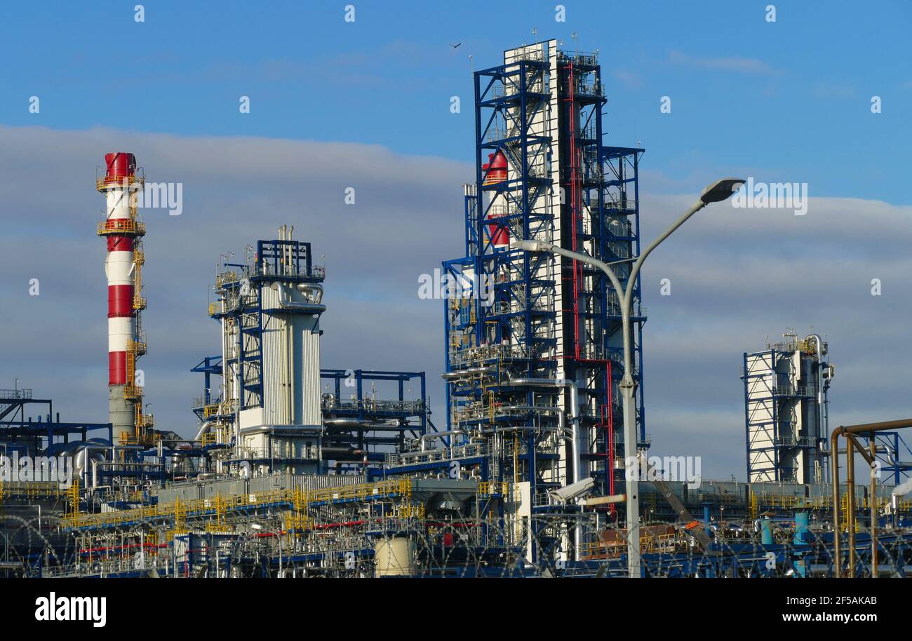 Corps of Moscow refinery in spring in clear weather 2021 Stock Photo ...