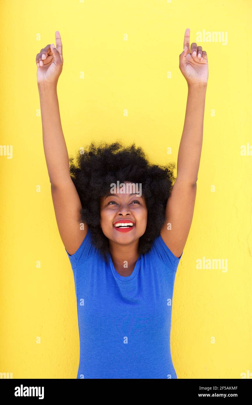 Young female laughing pointing hi-res stock photography and images - Alamy
