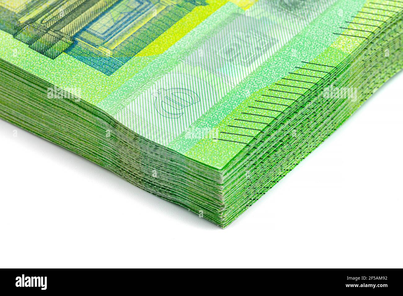 Macro shot of the European Union 100 EURO banknote, stack of banknotes ...