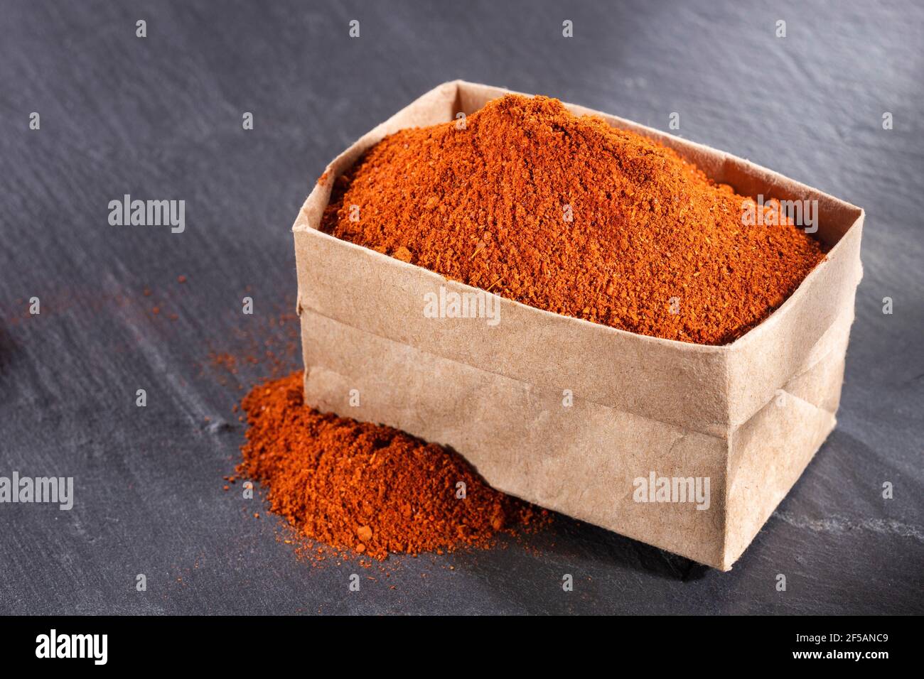 Organic paprika powder in paper bag - Capsicum annuum Stock Photo - Alamy