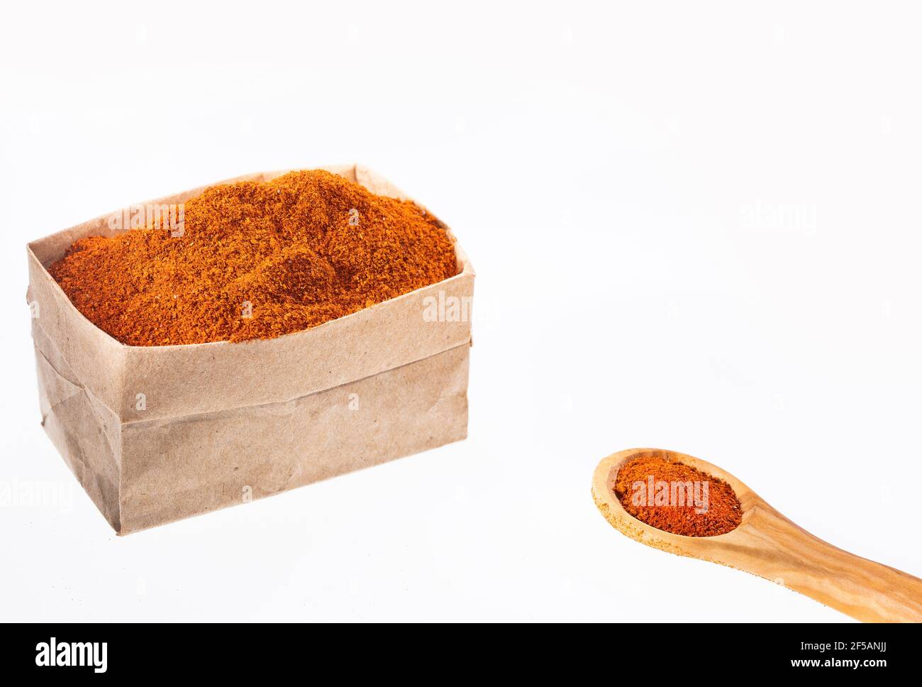 Capsicum annuum - Organic paprika powder in paper bag Stock Photo - Alamy