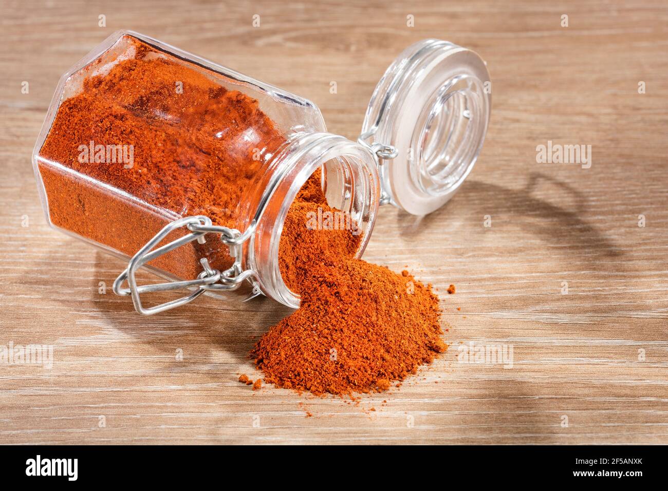 Capsicum annuum - Organic paprika powder in the jar Stock Photo - Alamy