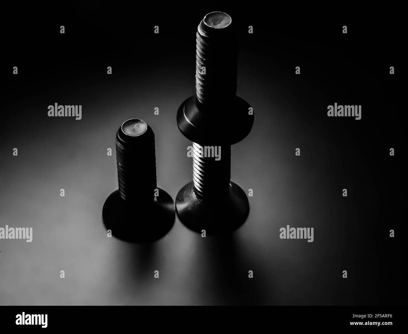 Rivets nuts and bolts pattern Black and White Stock Photos & Images - Alamy