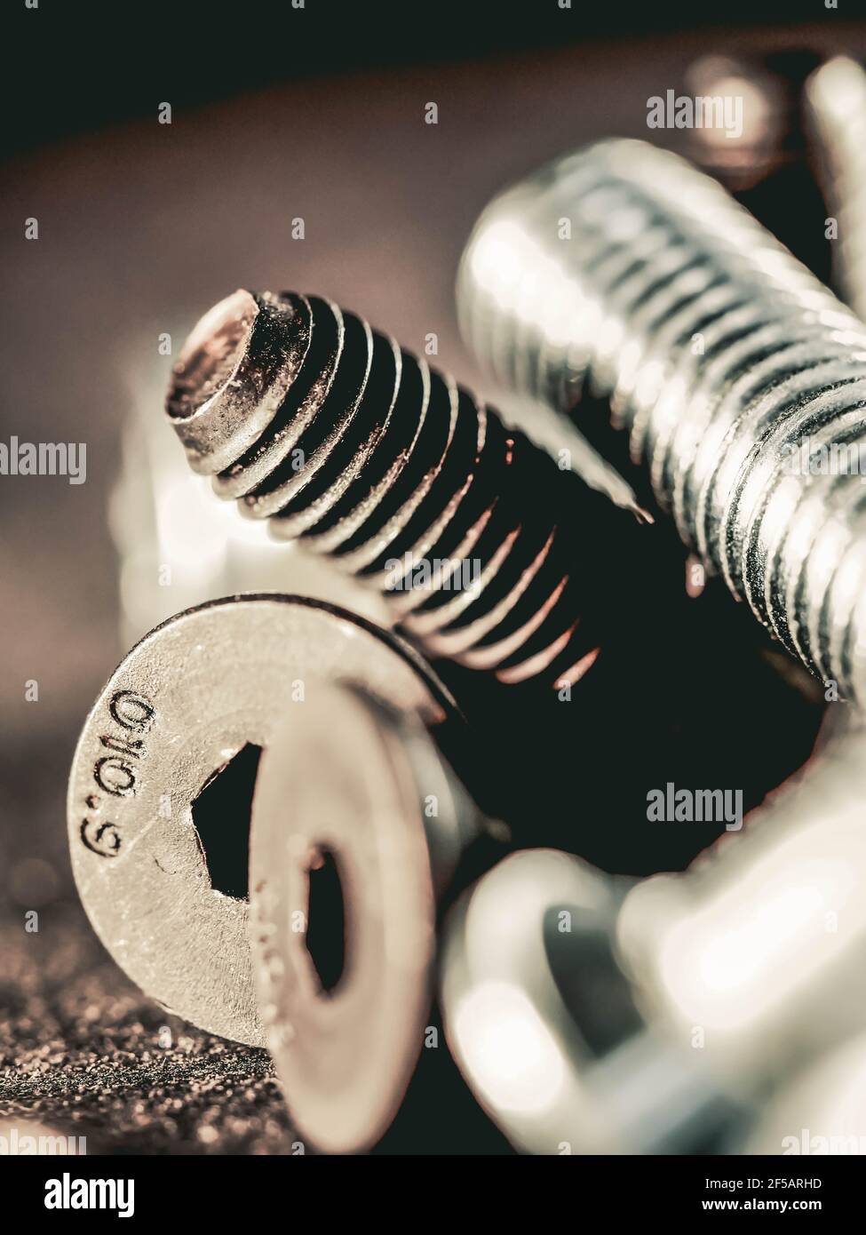 Close-up of various steel nuts and bolts Stock Photo - Alamy