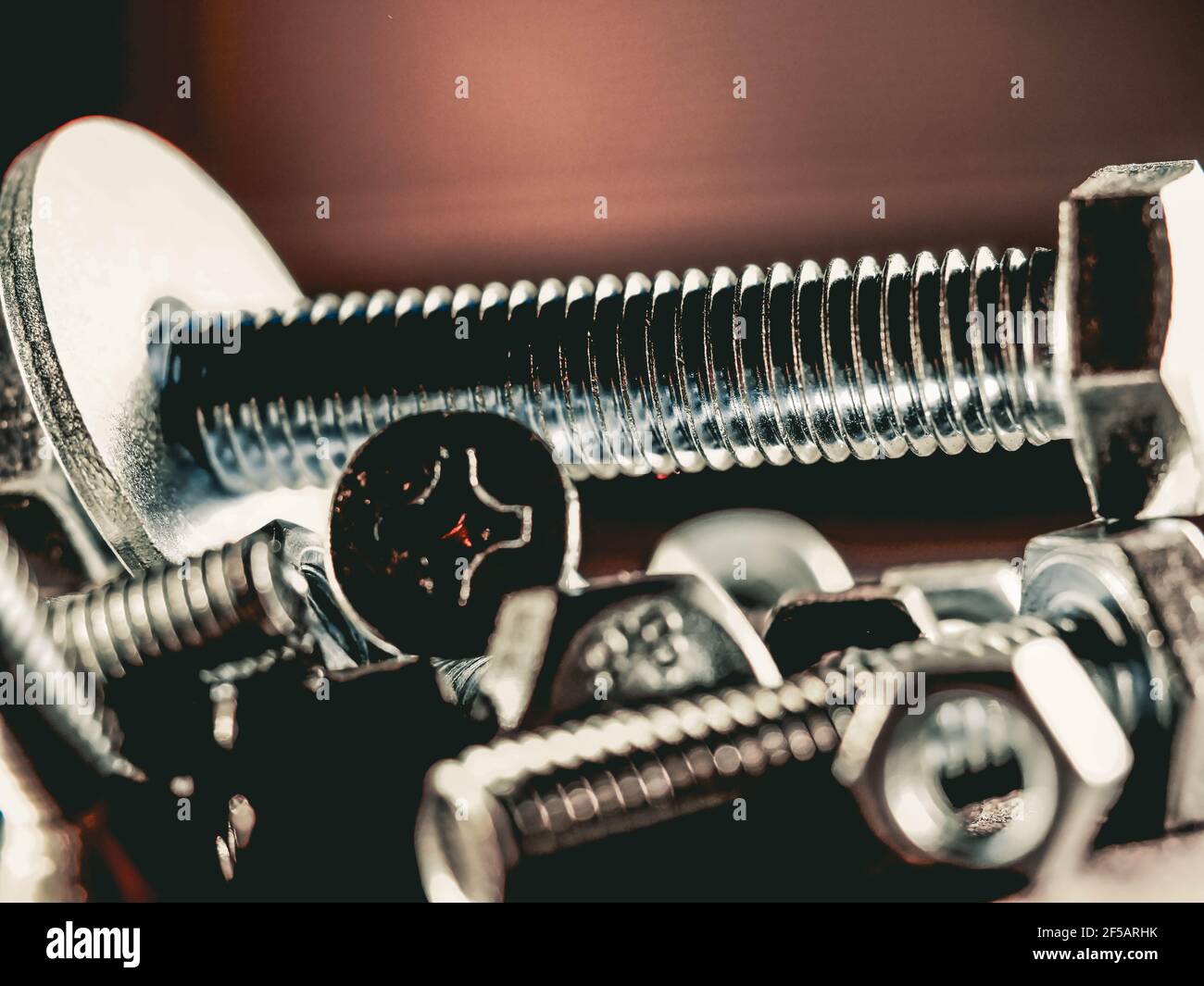 Close-up of various steel nuts and bolts Stock Photo - Alamy