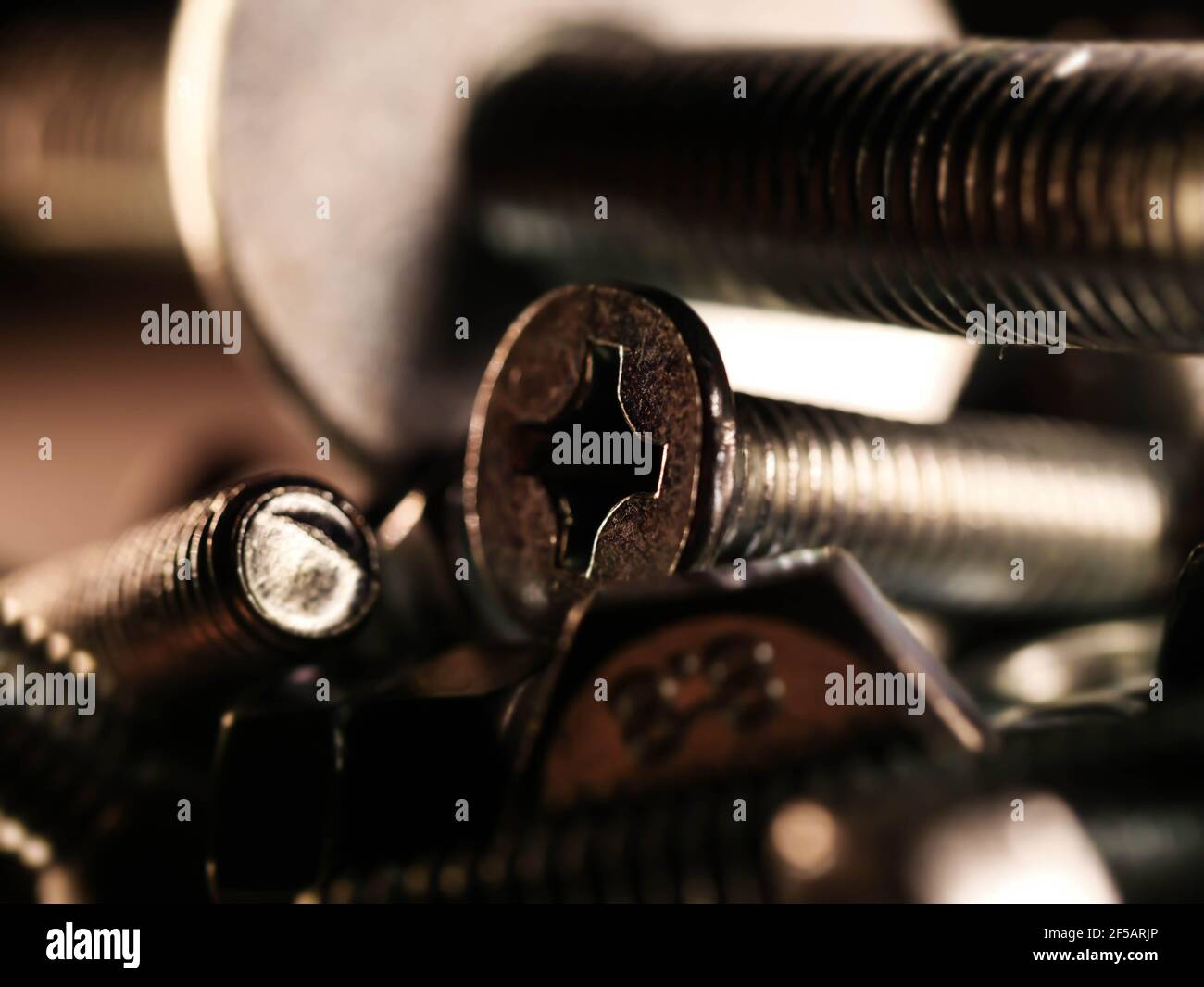Close-up of various steel nuts and bolts Stock Photo - Alamy