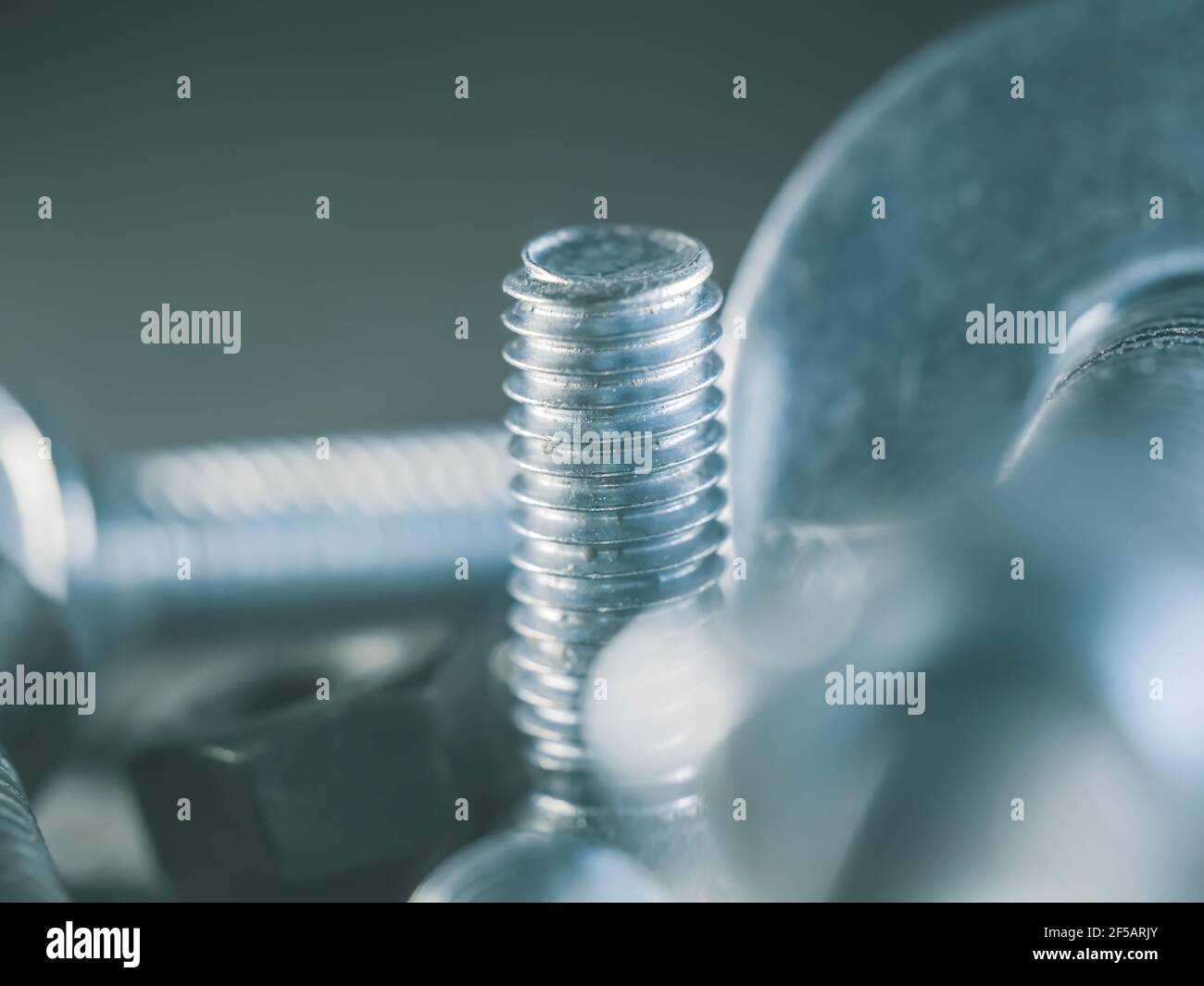 Close-up of various steel nuts and bolts Stock Photo - Alamy