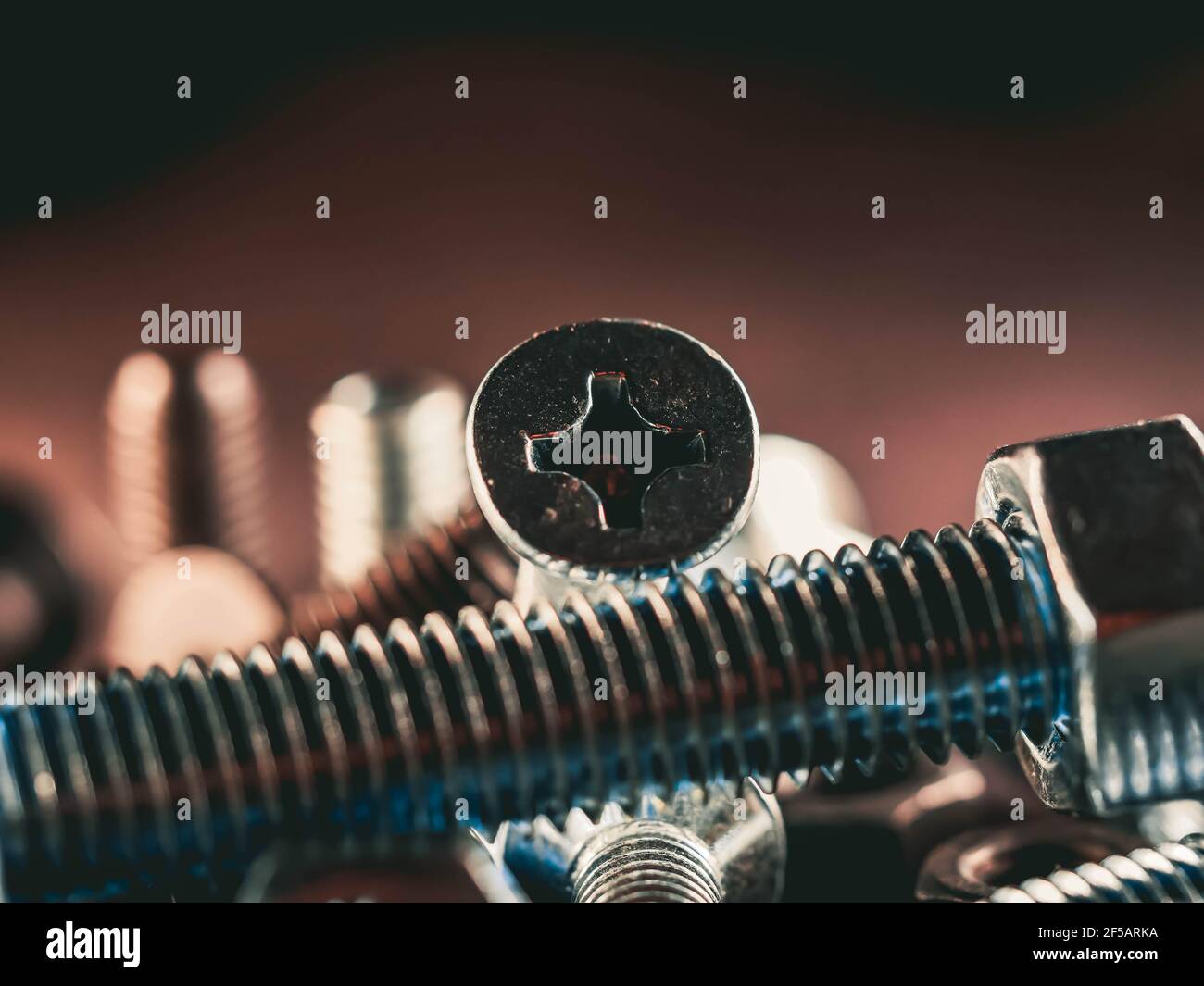 Close-up of various steel nuts and bolts Stock Photo - Alamy