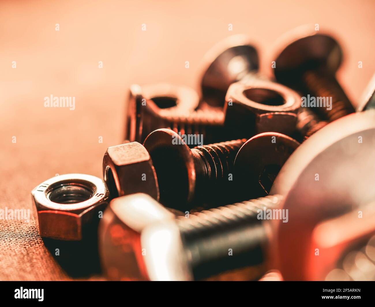 Close-up of various steel nuts and bolts Stock Photo - Alamy