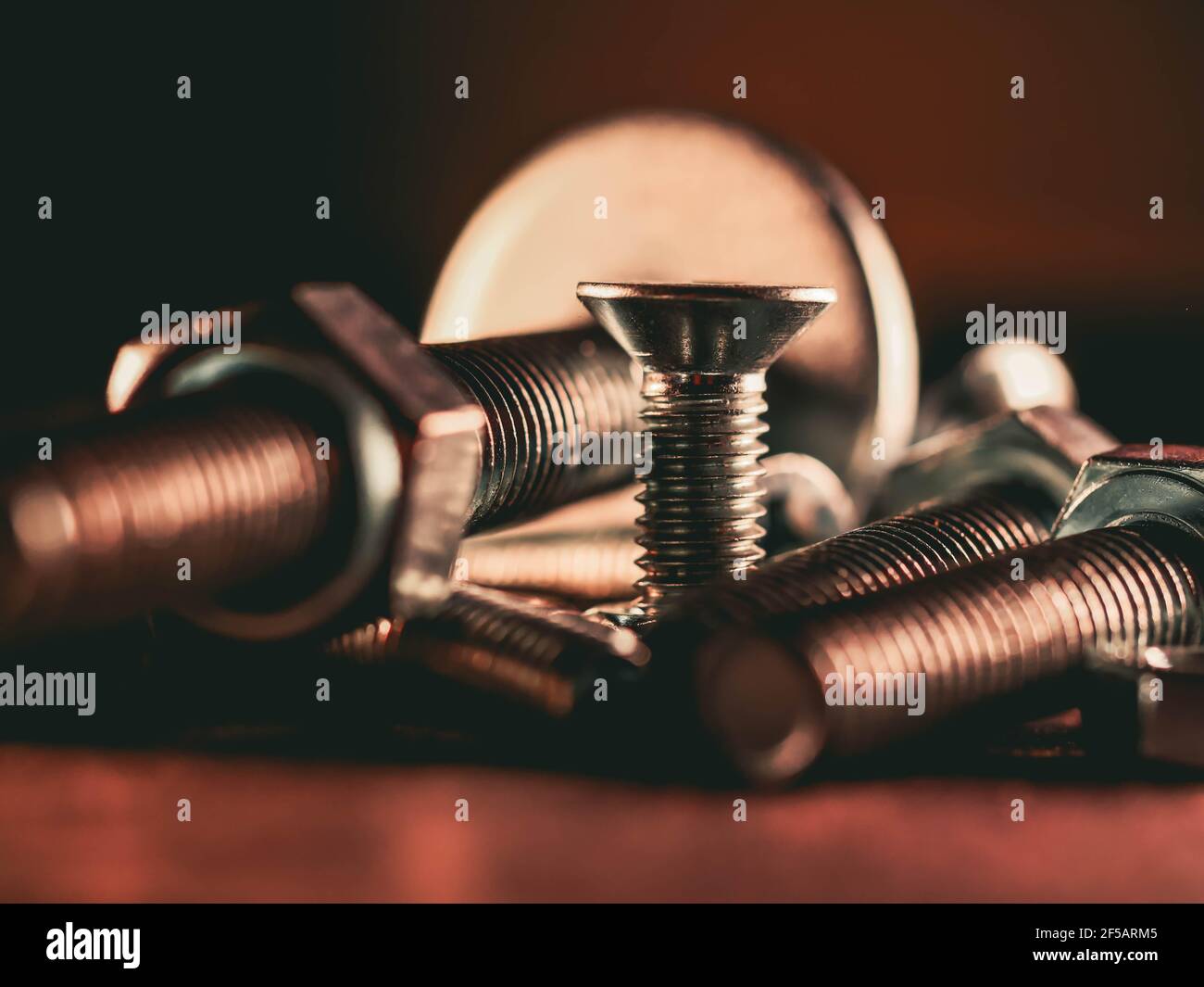 Close-up of various steel nuts and bolts Stock Photo - Alamy