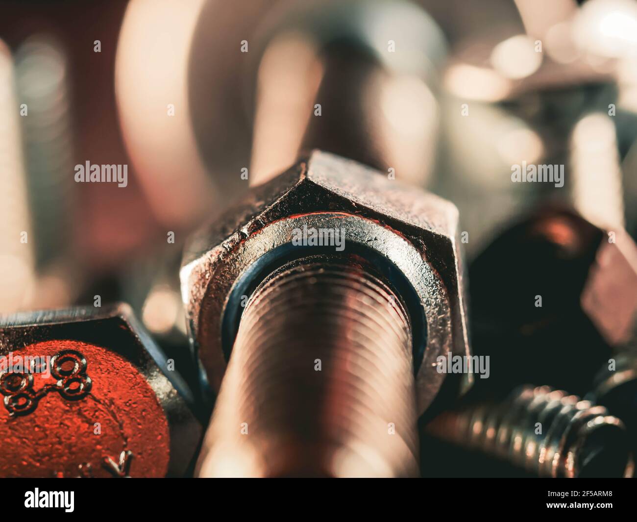 Close-up of various steel nuts and bolts Stock Photo - Alamy