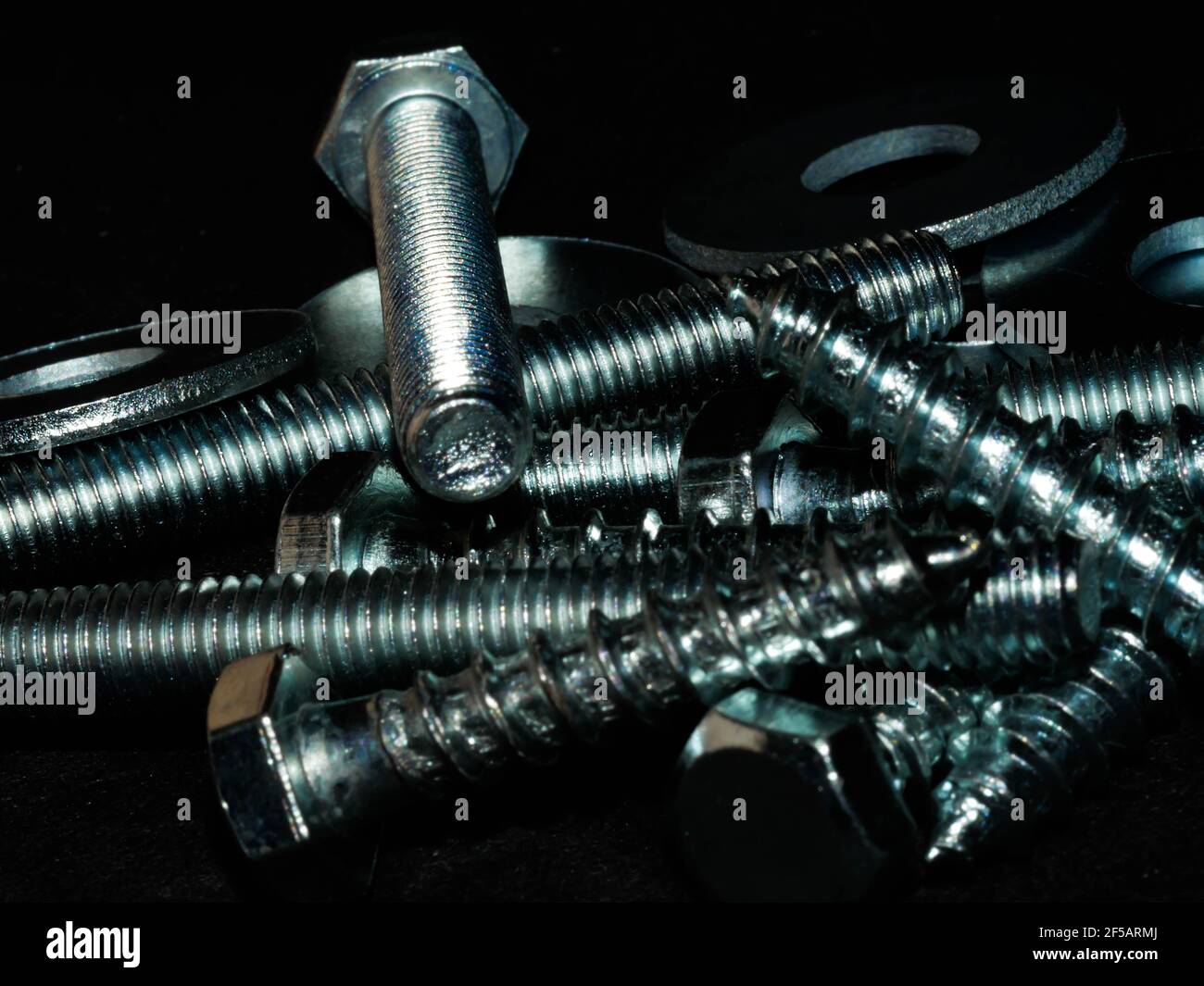Close-up of various steel nuts and bolts Stock Photo - Alamy