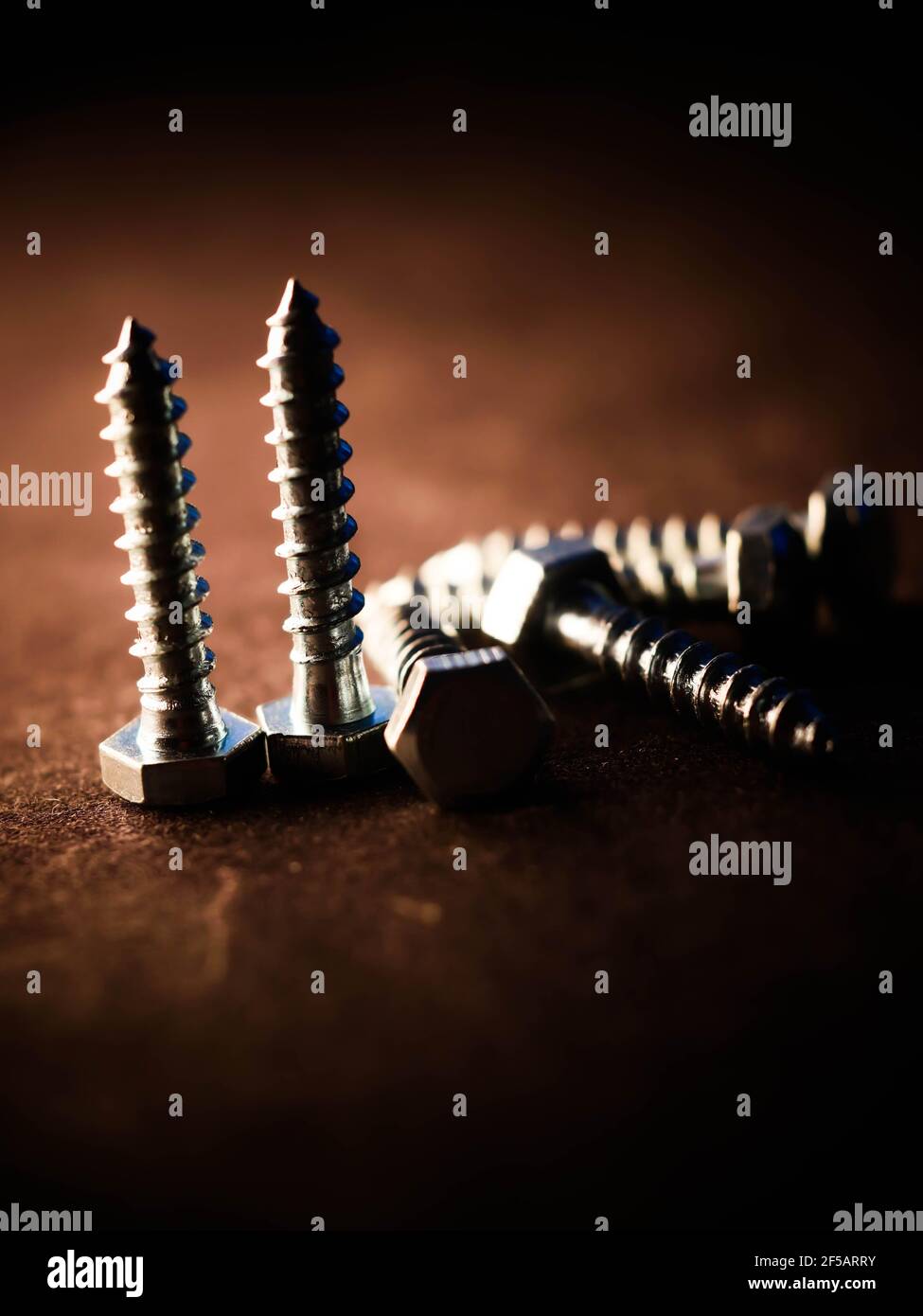 Close-up of various steel nuts and bolts Stock Photo - Alamy