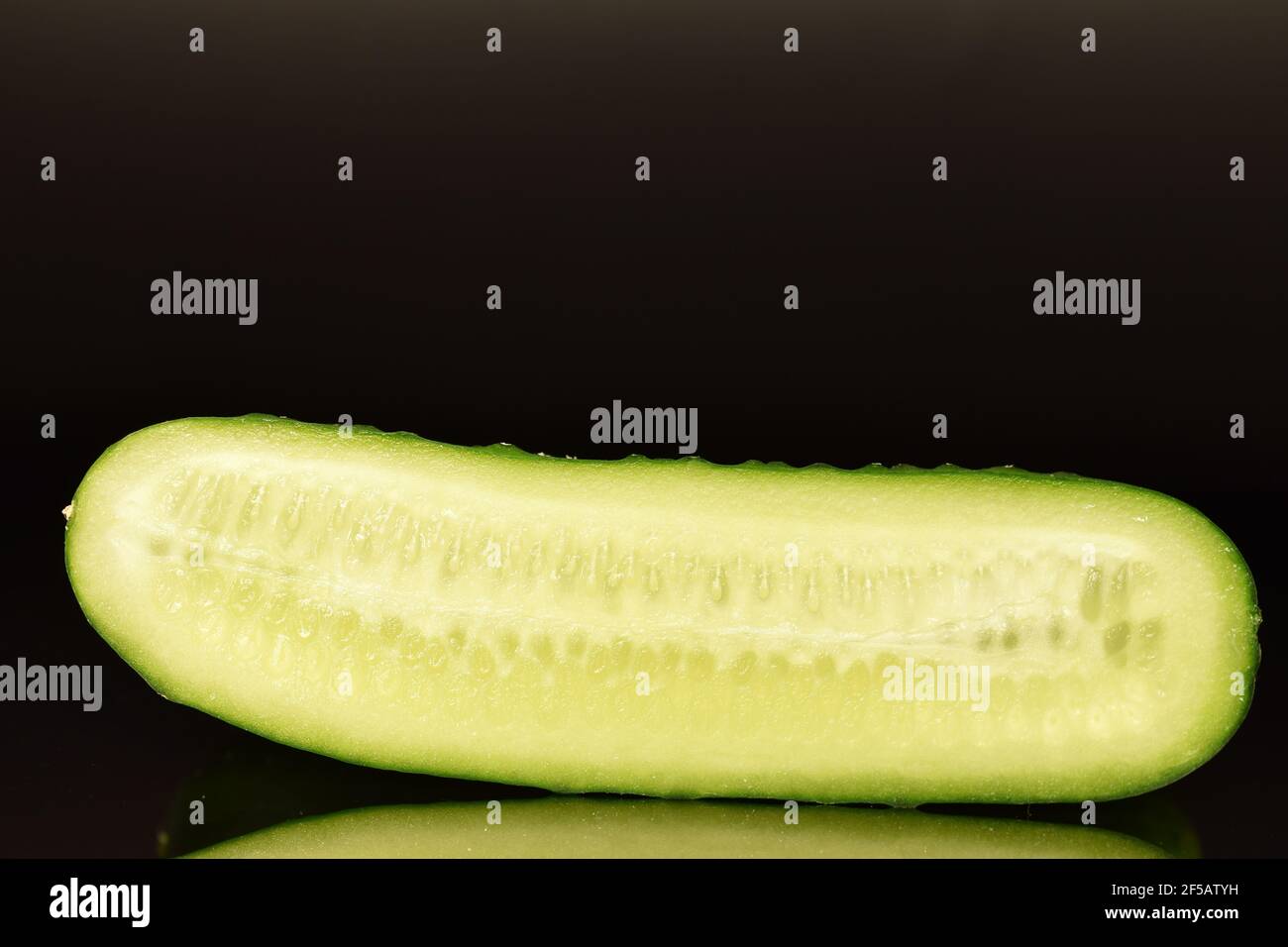 Closeup sliced cucumber on black hi-res stock photography and images ...