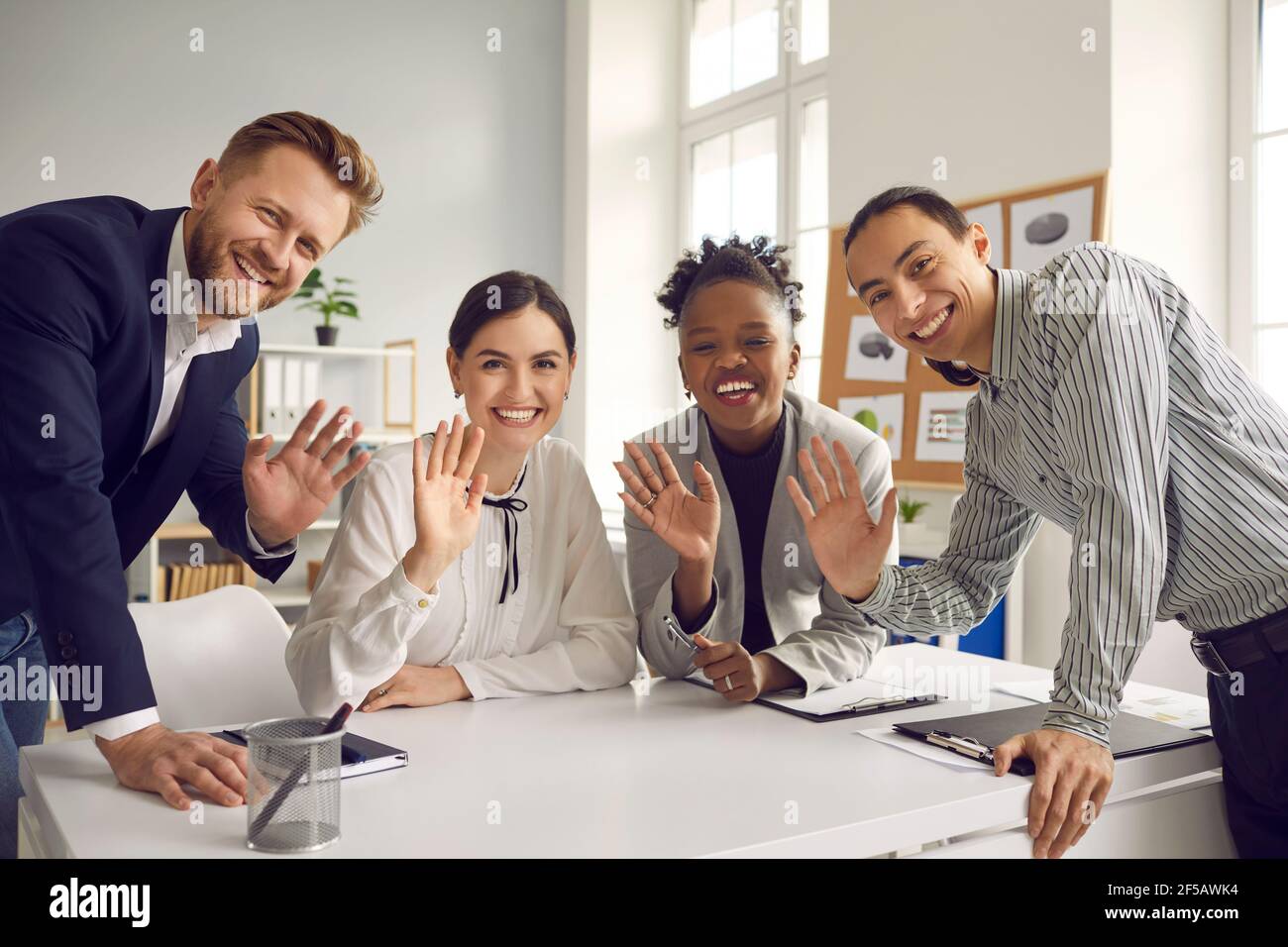 People Waving Hello To Each Other