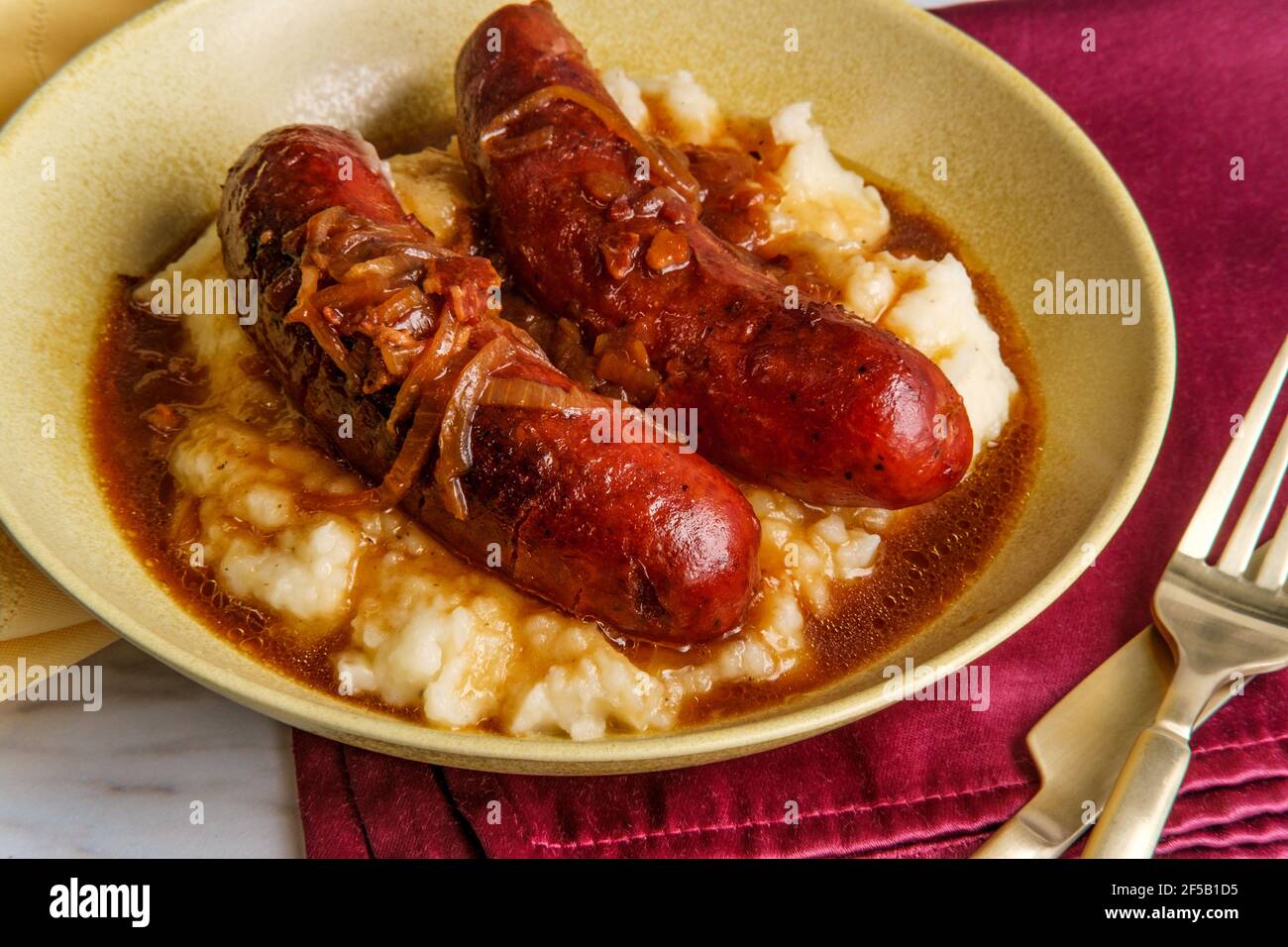 British bangers and mash sausage and mashed potatoes with onion gravy ...