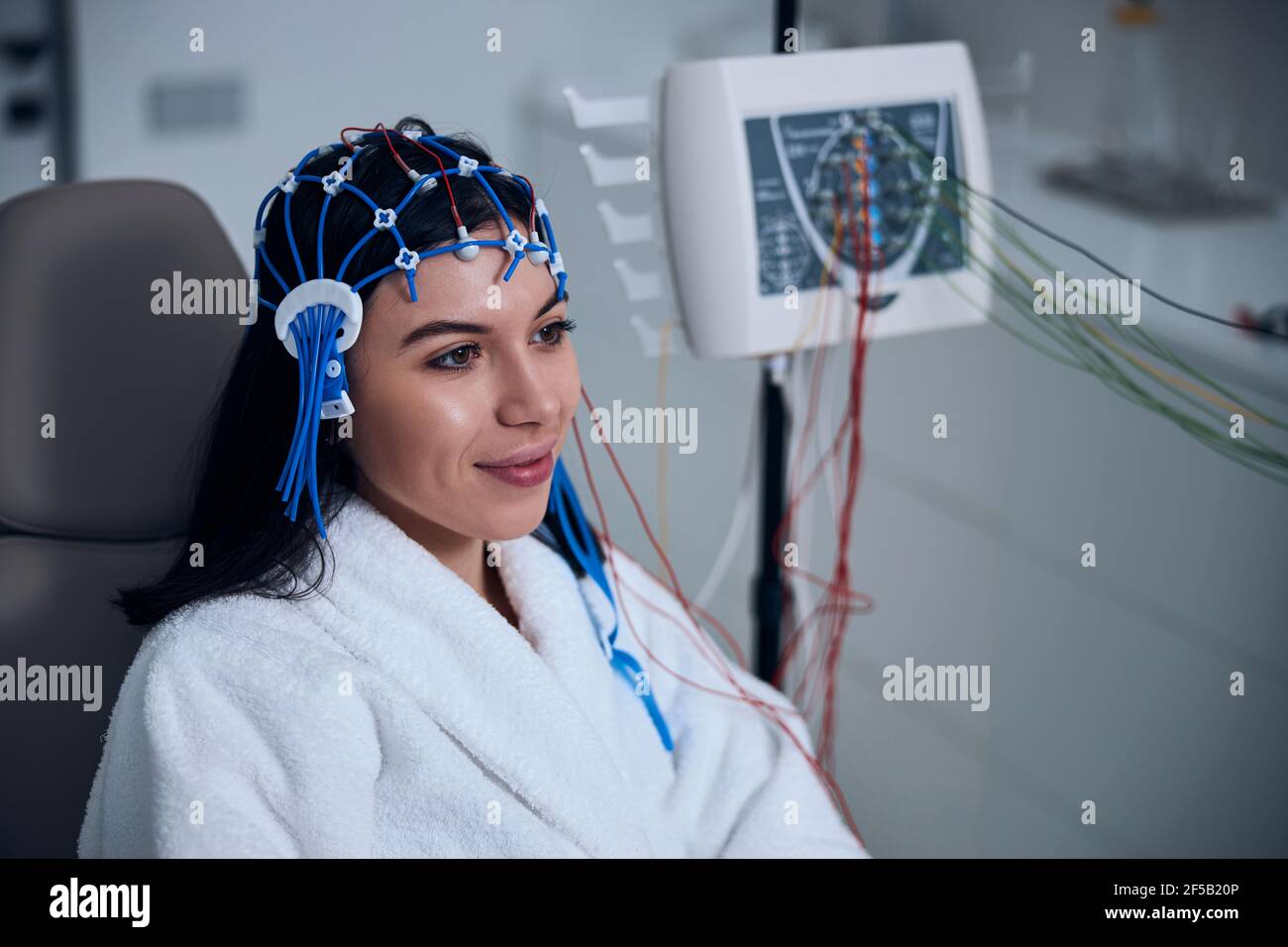 Pleased female patient undergoing an EEG test Stock Photo - Alamy Pleased female patient undergoing an EEG test Stock Photo - Alamy