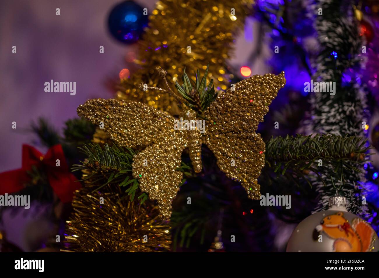 Decorated Christmas tree on blurred background Stock Photo - Alamy