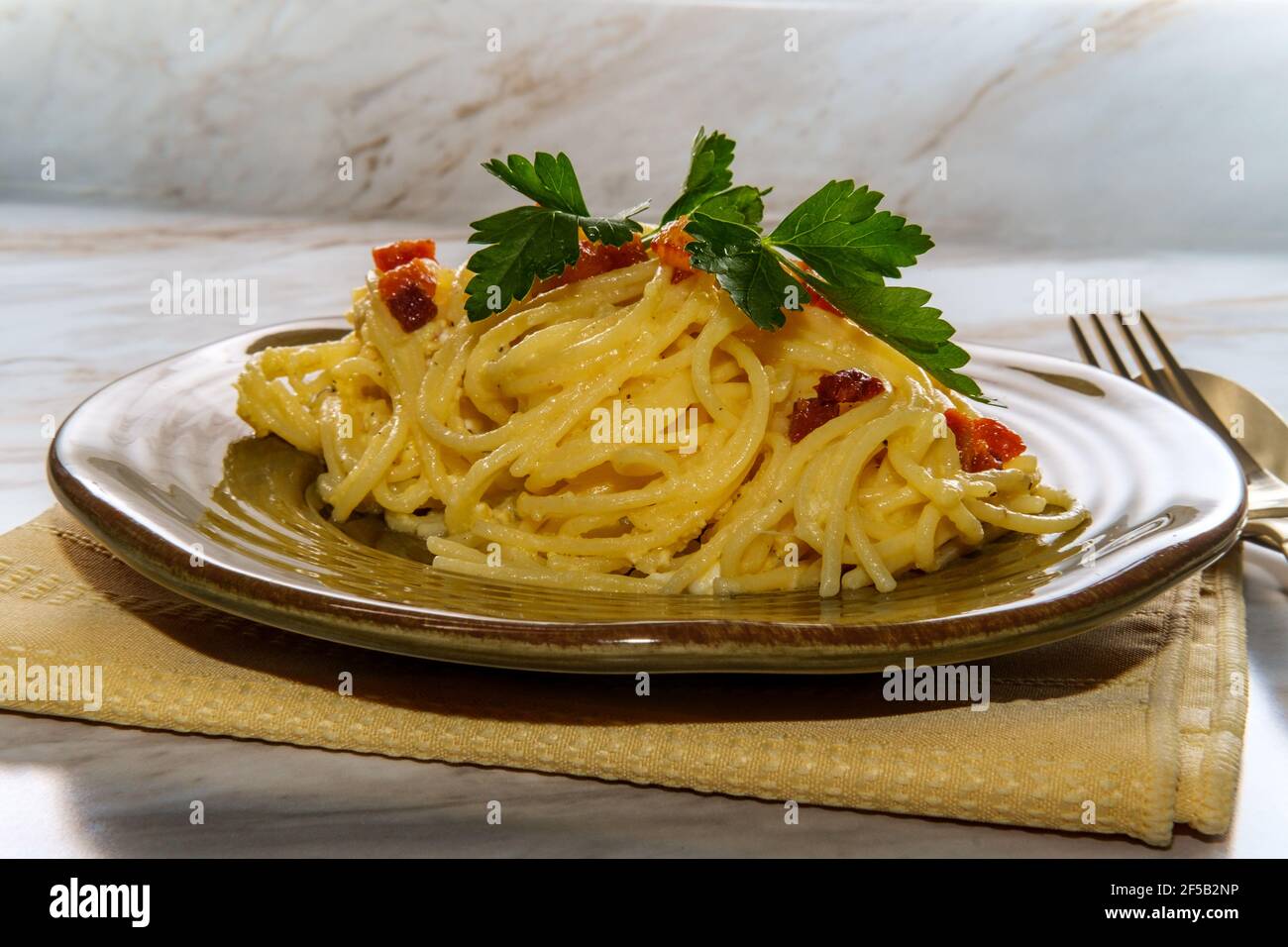 Creamy Italian cuisine spaghetti alla carbonara with pancetta and ...